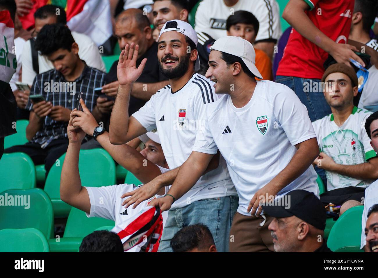 Basra, Iraq. 05th Sep, 2024. Iraqi fans dance during the 2026 FIFA ...