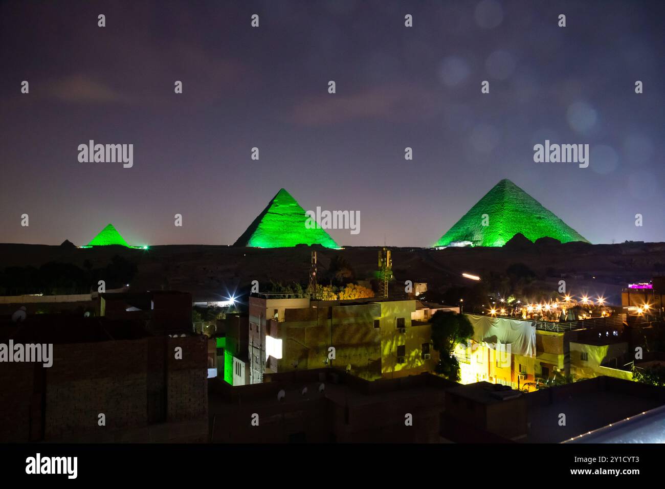 The Great Pyramid complex enlighted at night, Giza, Egypt Stock Photo ...