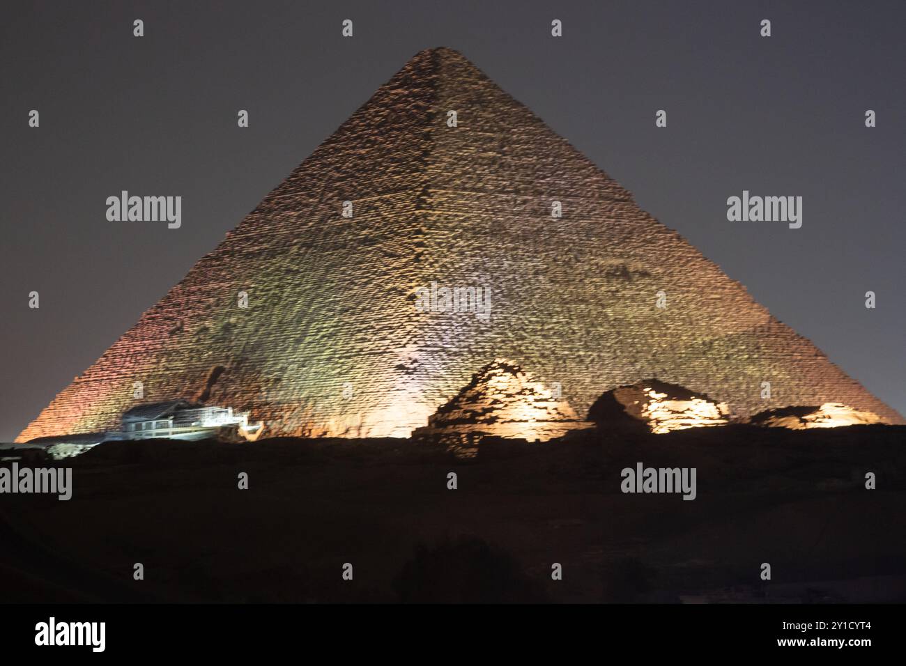 The Great Pyramid complex enlighted at night, Giza, Egypt Stock Photo ...