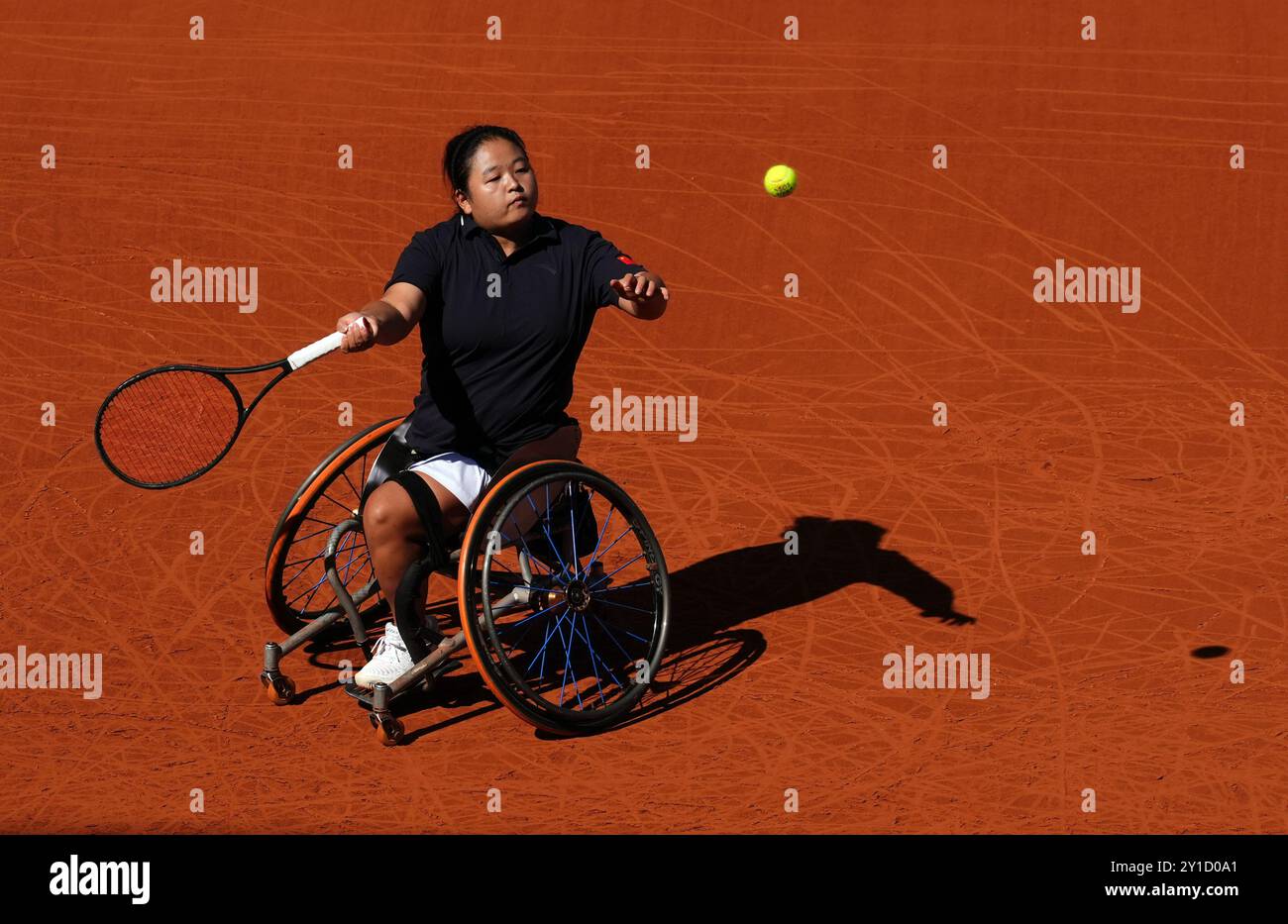 China's Ziying Wang in action against Aniek van Koot of the Netherlands ...