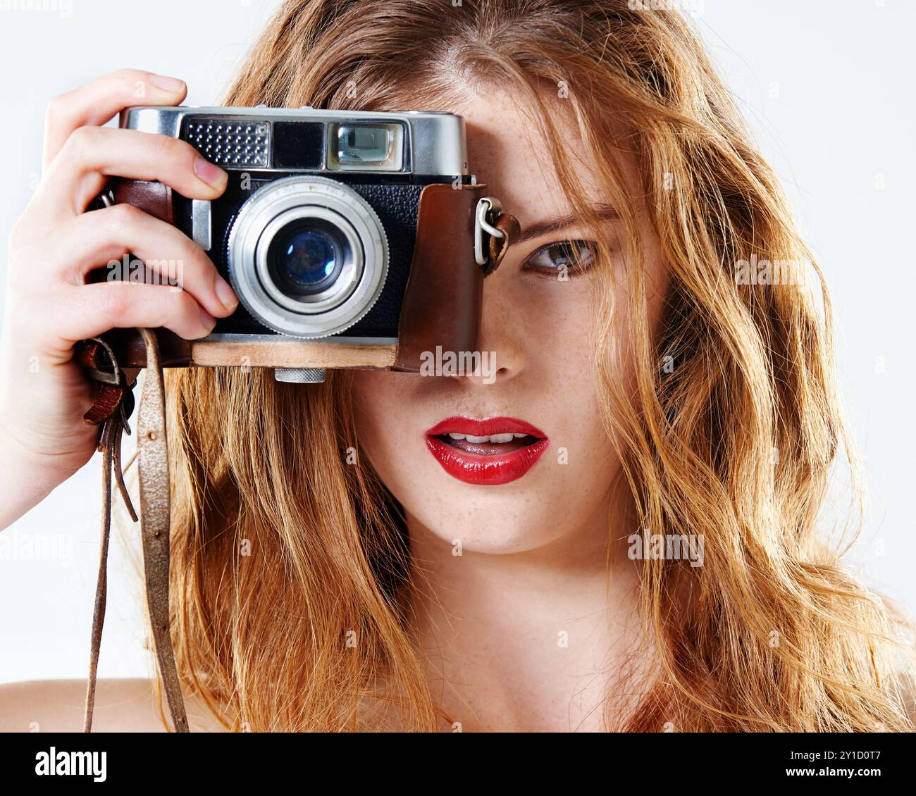Woman, photographer and portrait in studio with camera, retro equipment ...