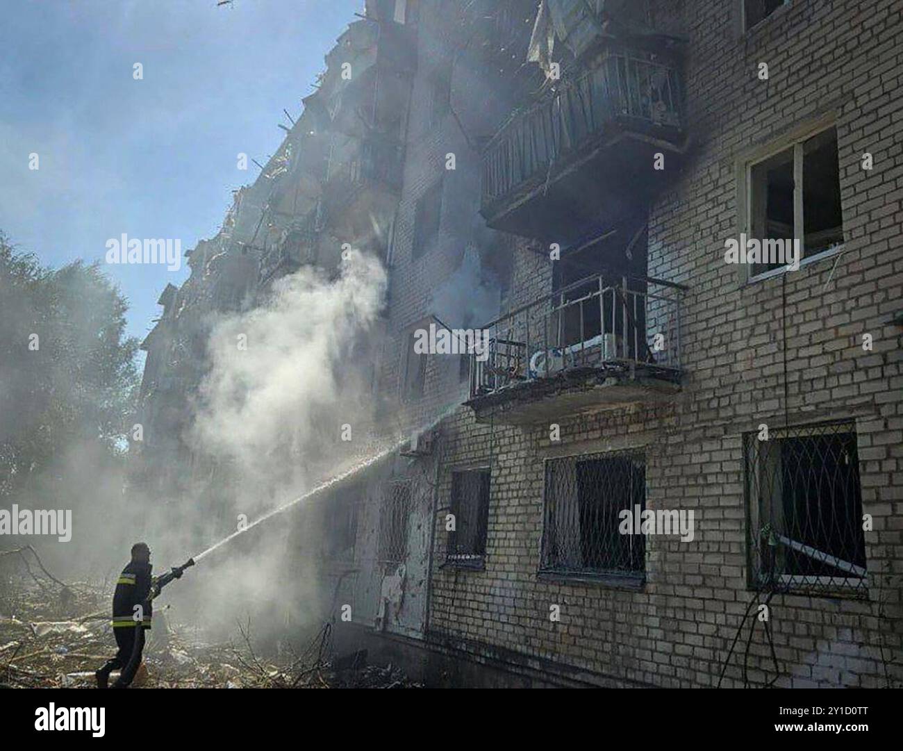 In this photo provided by the Ukrainian Emergency Service, firefighters ...