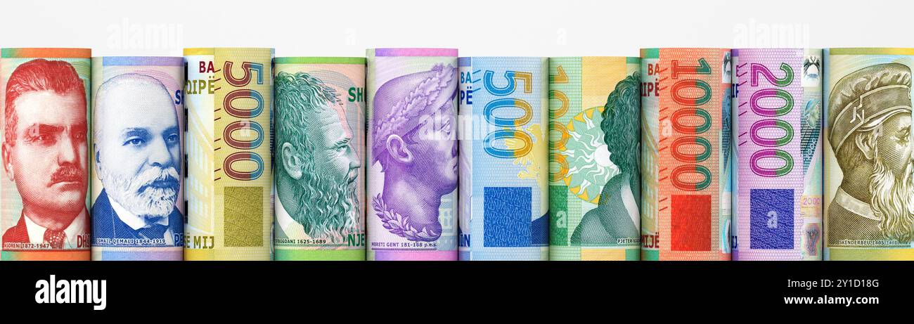 Rolled Albanian lek banknotes in various denominations, highlighting ...