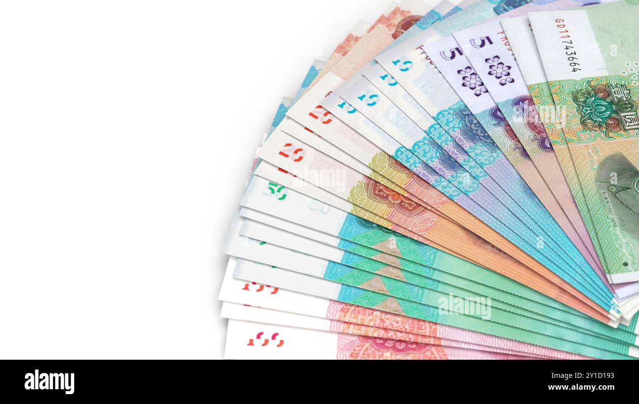 Chinese yuan banknotes arranged on a white background, highlighting ...