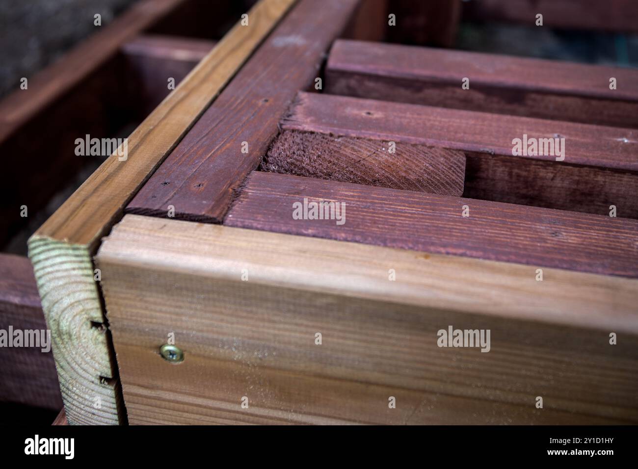 Wooden construction for terrace, planks, screws and piles Stock Photo ...