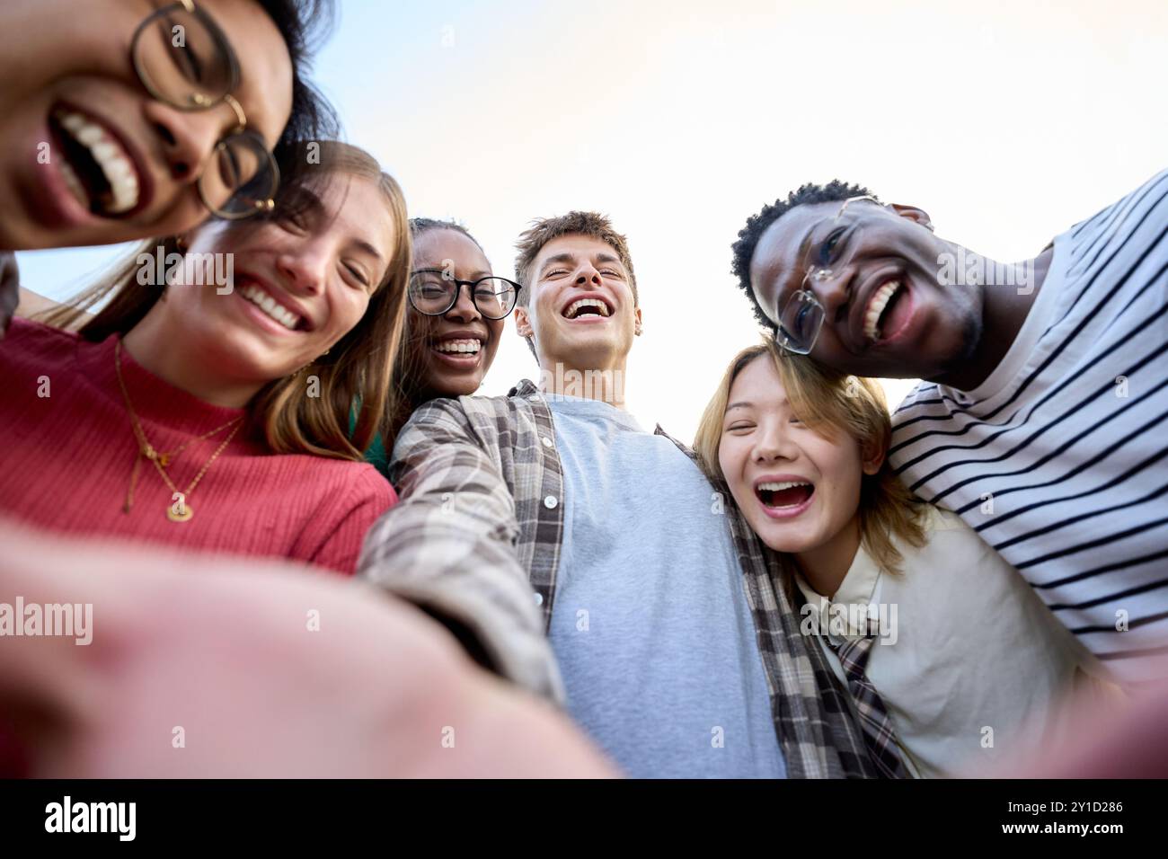 Selfie portrait international Gen z friends group looking excited at ...