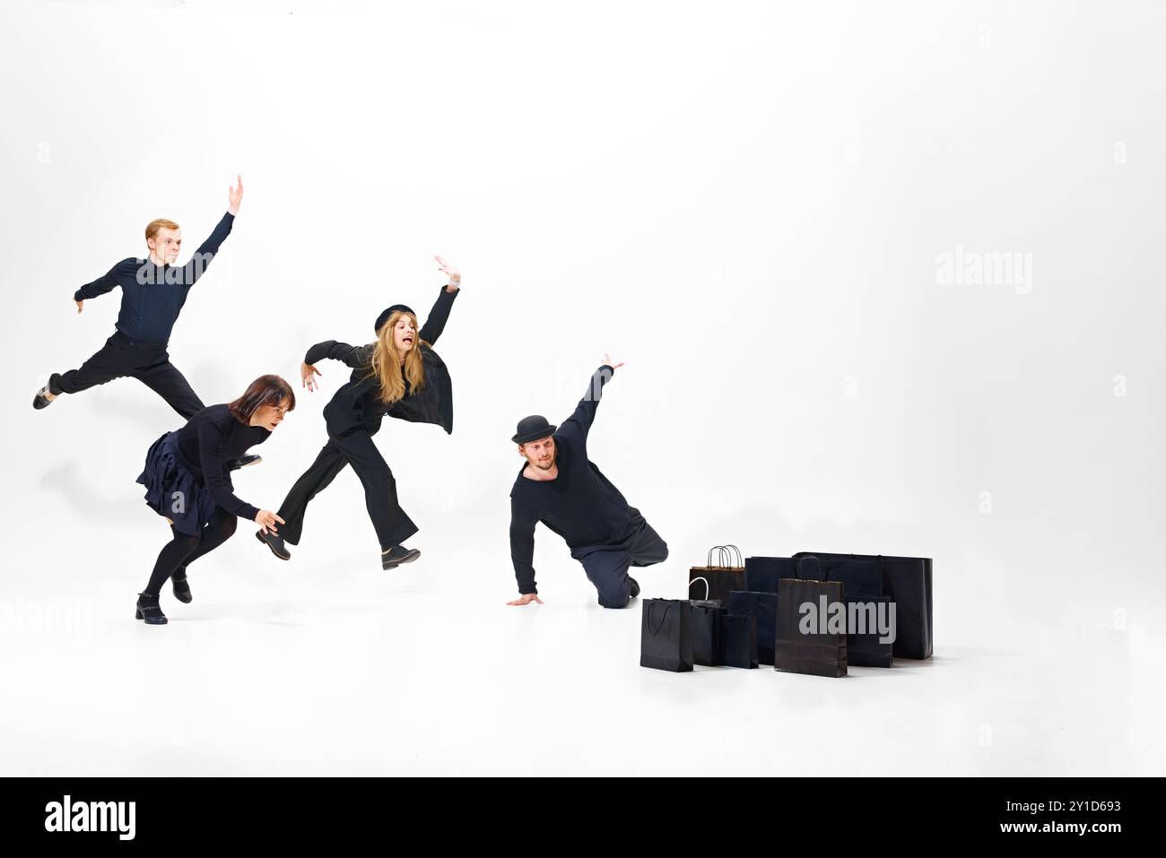 Group of people all in black clothes showing excitement and energy for ...