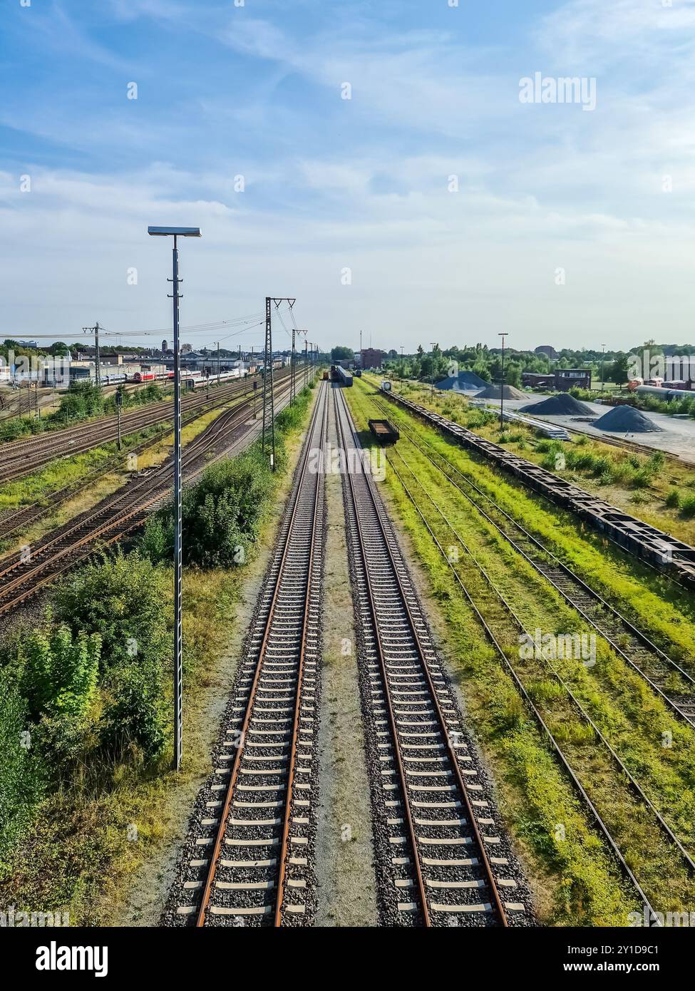 View of the tracks of a freight station with some wagons and numerous ...
