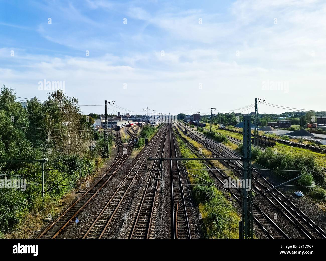 View of the tracks of a freight station with some wagons and numerous ...