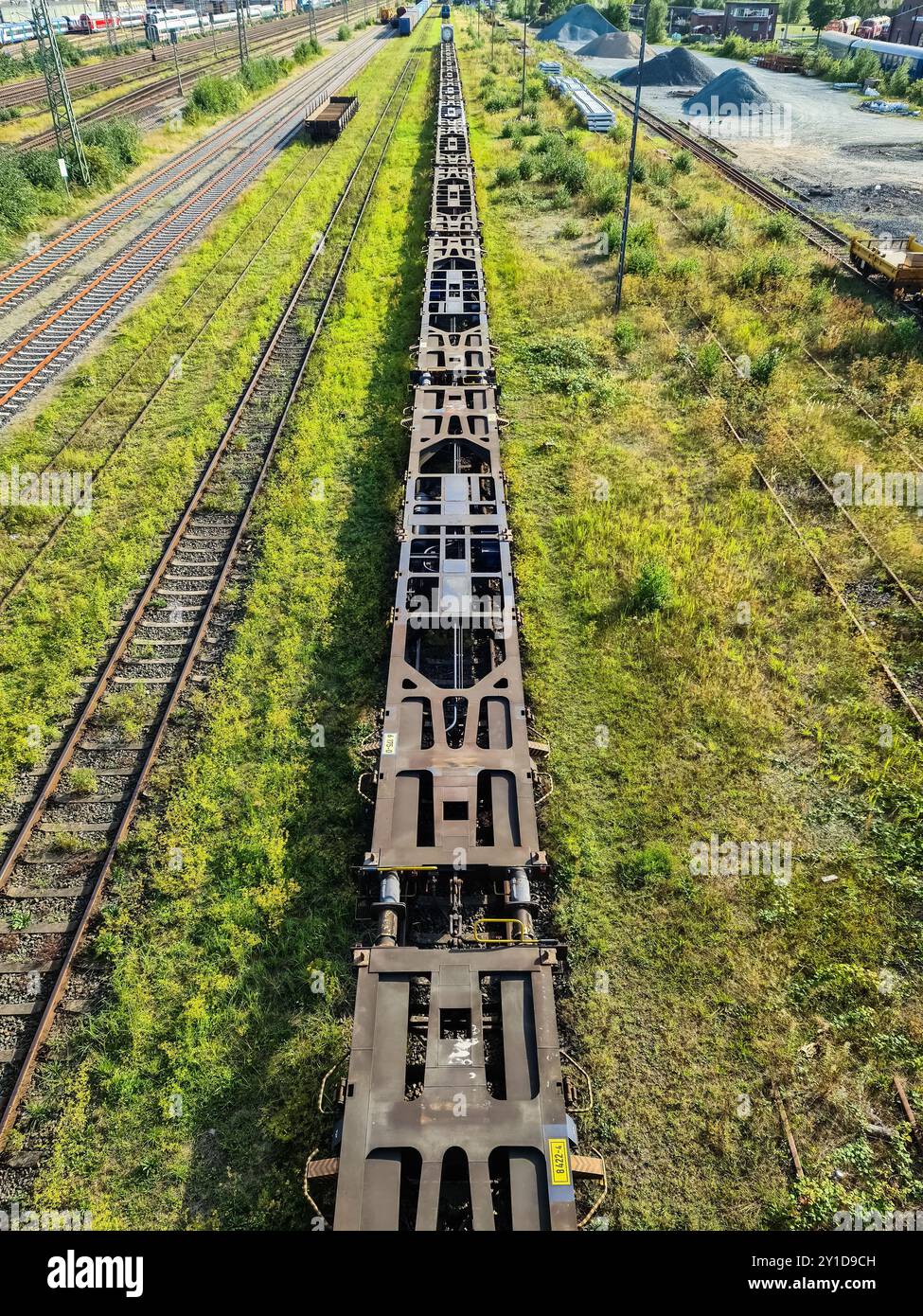 View of the tracks of a freight station with some wagons and numerous ...