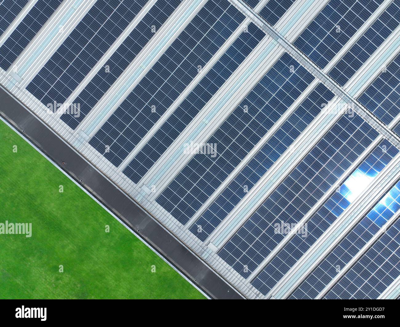 Solar energy for factory and warehouse building. Solar panels on roof ...