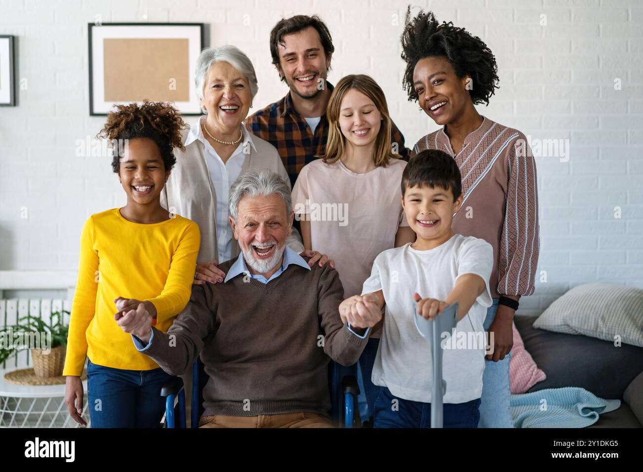 Extended multiethnic diverse family with children,grandparents and parents having fun together ...