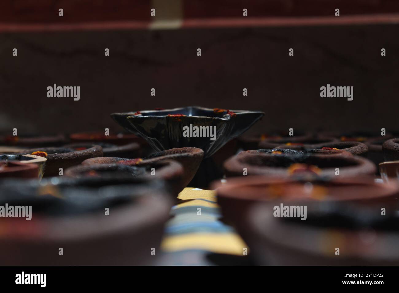 Artistic homemade clay oil lamps or karthikai deepam are ready for ...