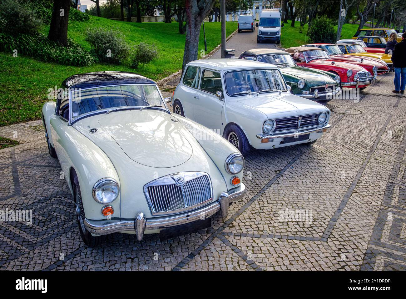Lisbon, Portugal - Jan 20, 2024: A row of vintage cars of MG and Mini ...