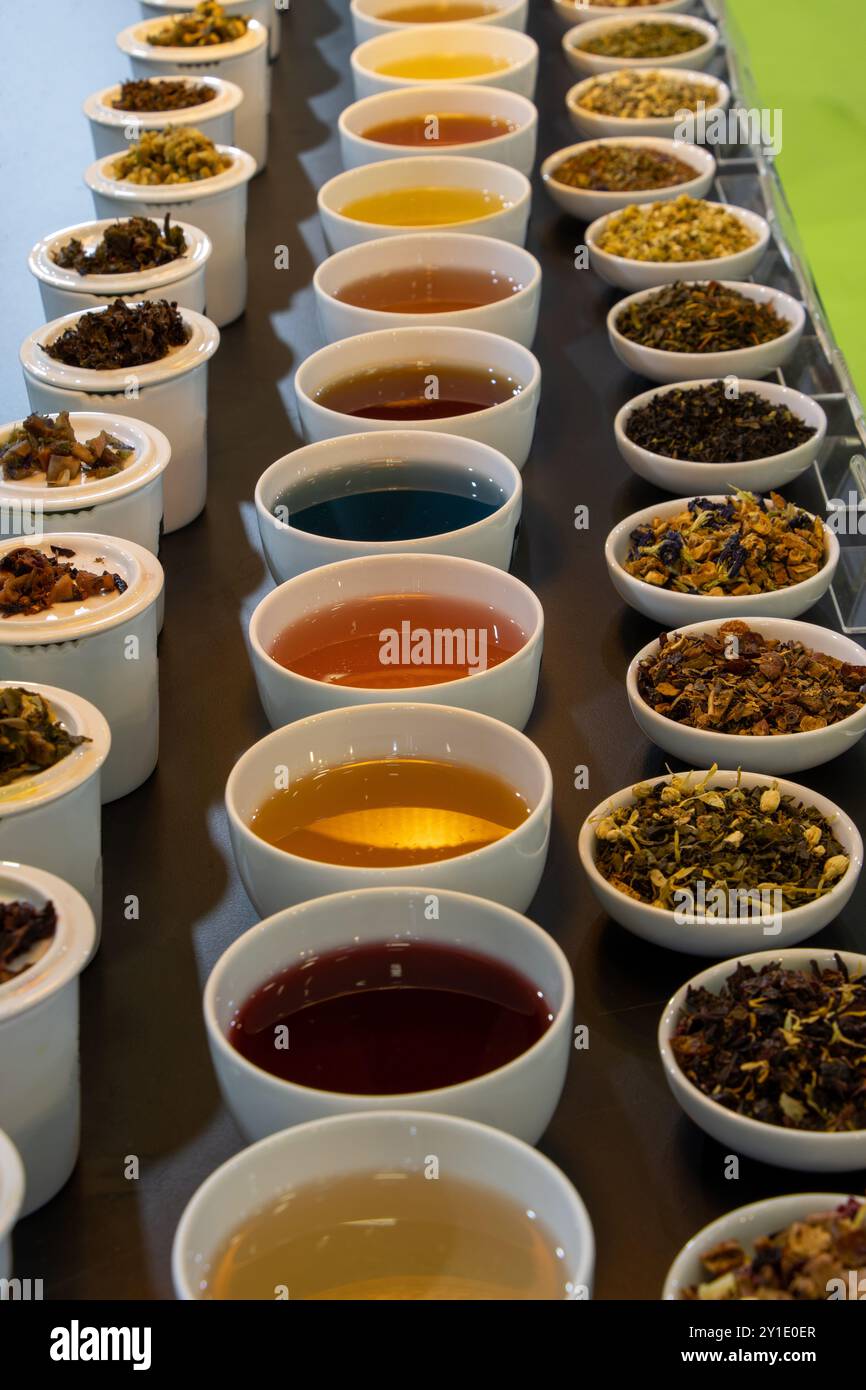 Various herbal teas in porcelain cups and bowls Stock Photo - Alamy