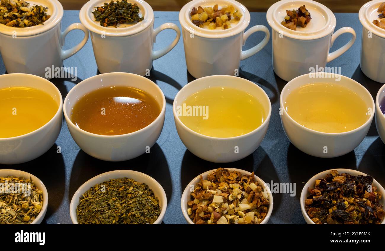 Various herbal teas in porcelain cups and bowls Stock Photo - Alamy