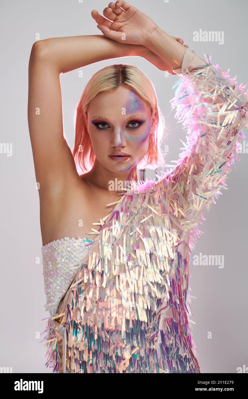 A stylish young woman showcases holographic fashion with a striking ...