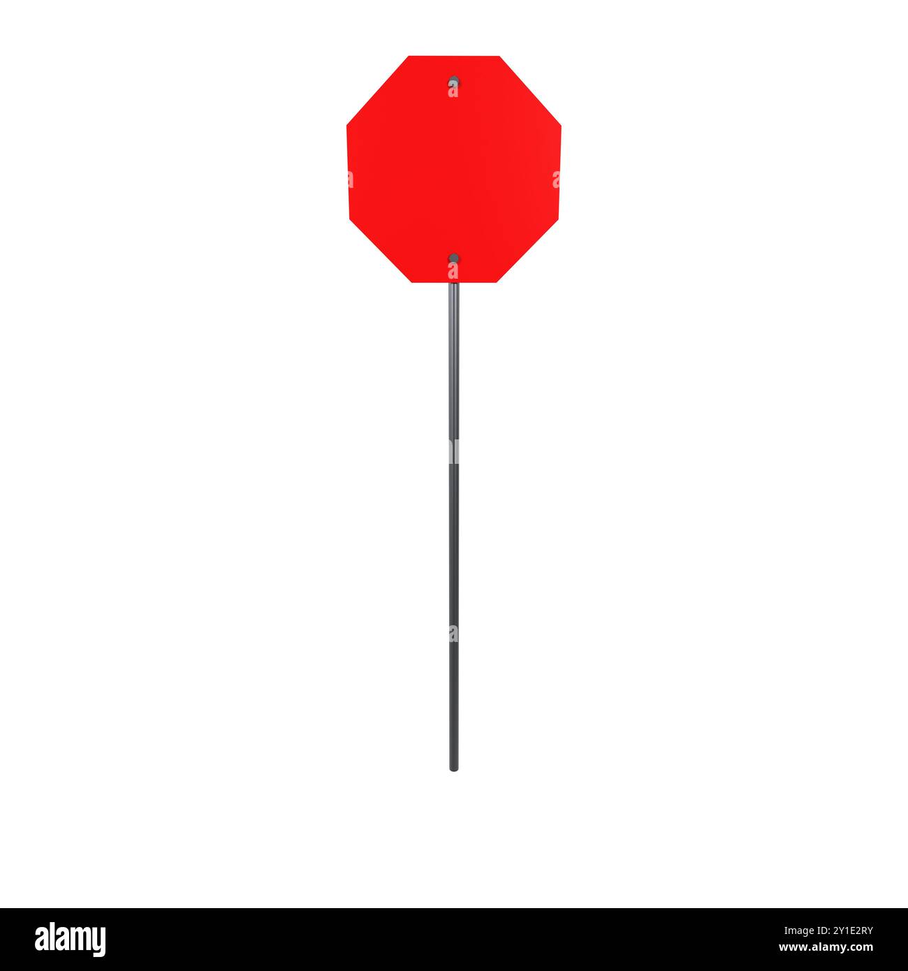 A red stop sign with a black pole stands alone against a clear ...