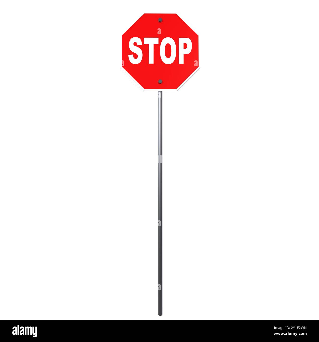 A red octagonal sign displaying the word STOP stands alone by a road in ...