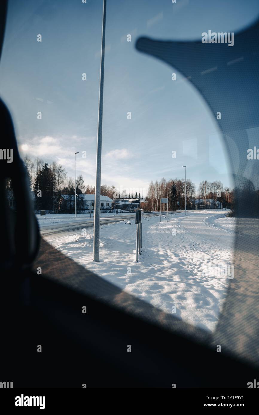 Snowy Rovaniemi street view out bus window in Lapland in winter Stock ...