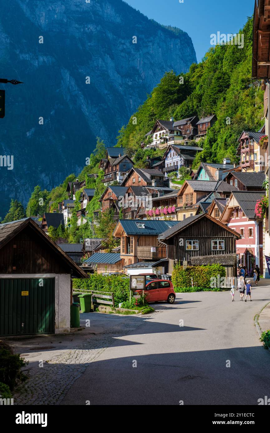 Nestled between majestic mountains, Hallstatt reveals colorful houses ...