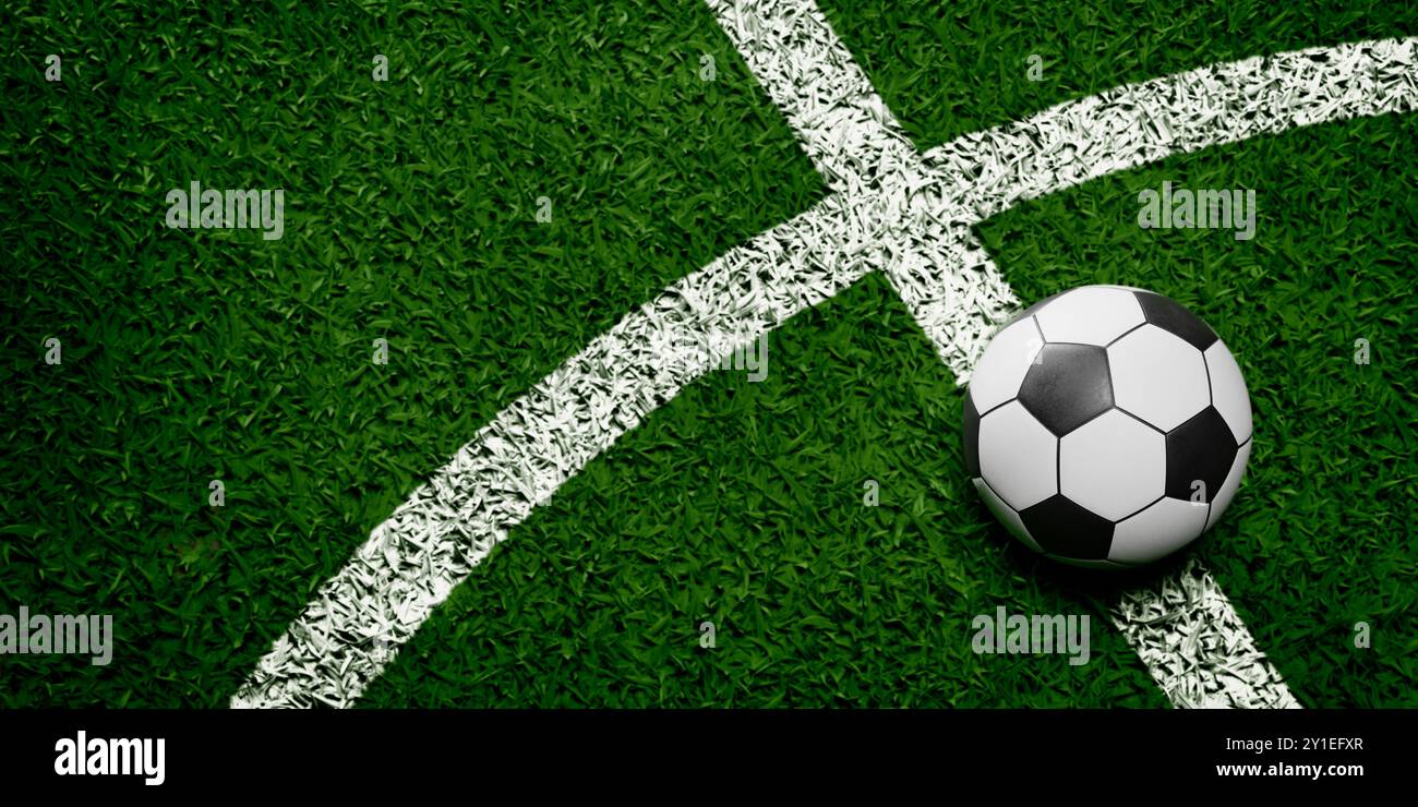 Soccer ball on on sport stadium grass background from above. Football ...