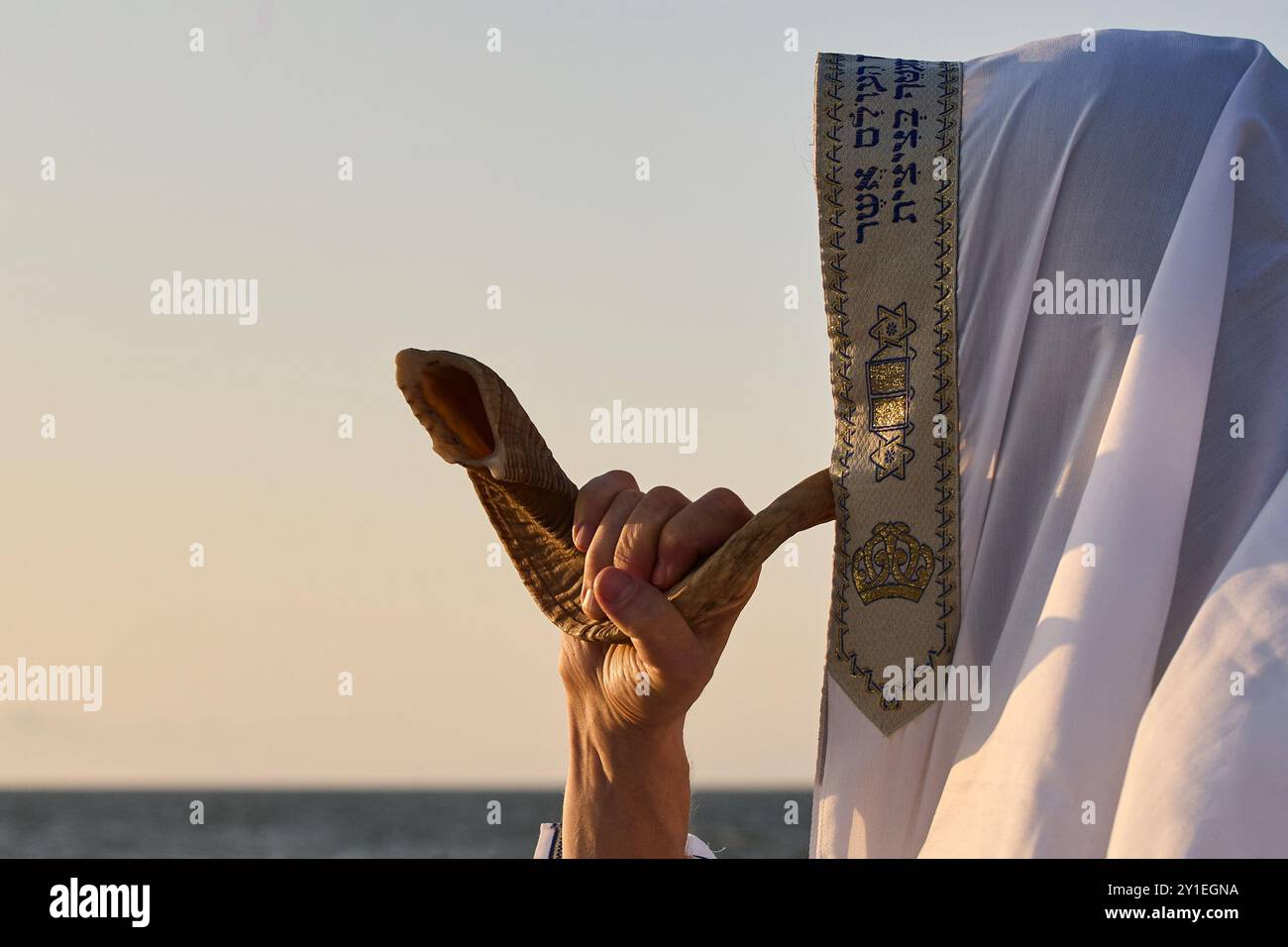 Jewish man blowing the Shofar rams horn on Rosh Hashanah and Yom Kippur ...