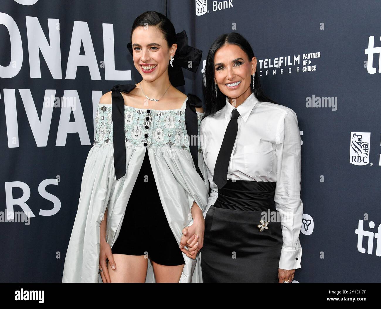 Margaret Qualley Left And Demi Moore Attend The Premiere Of The Margaret Qualley Left And Demi Moore Attend The Premiere Of The