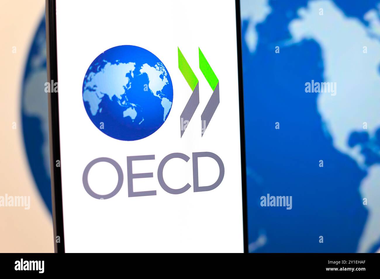 In this photo illustration, the Organisation for Economic Co-operation and Development (OECD ...