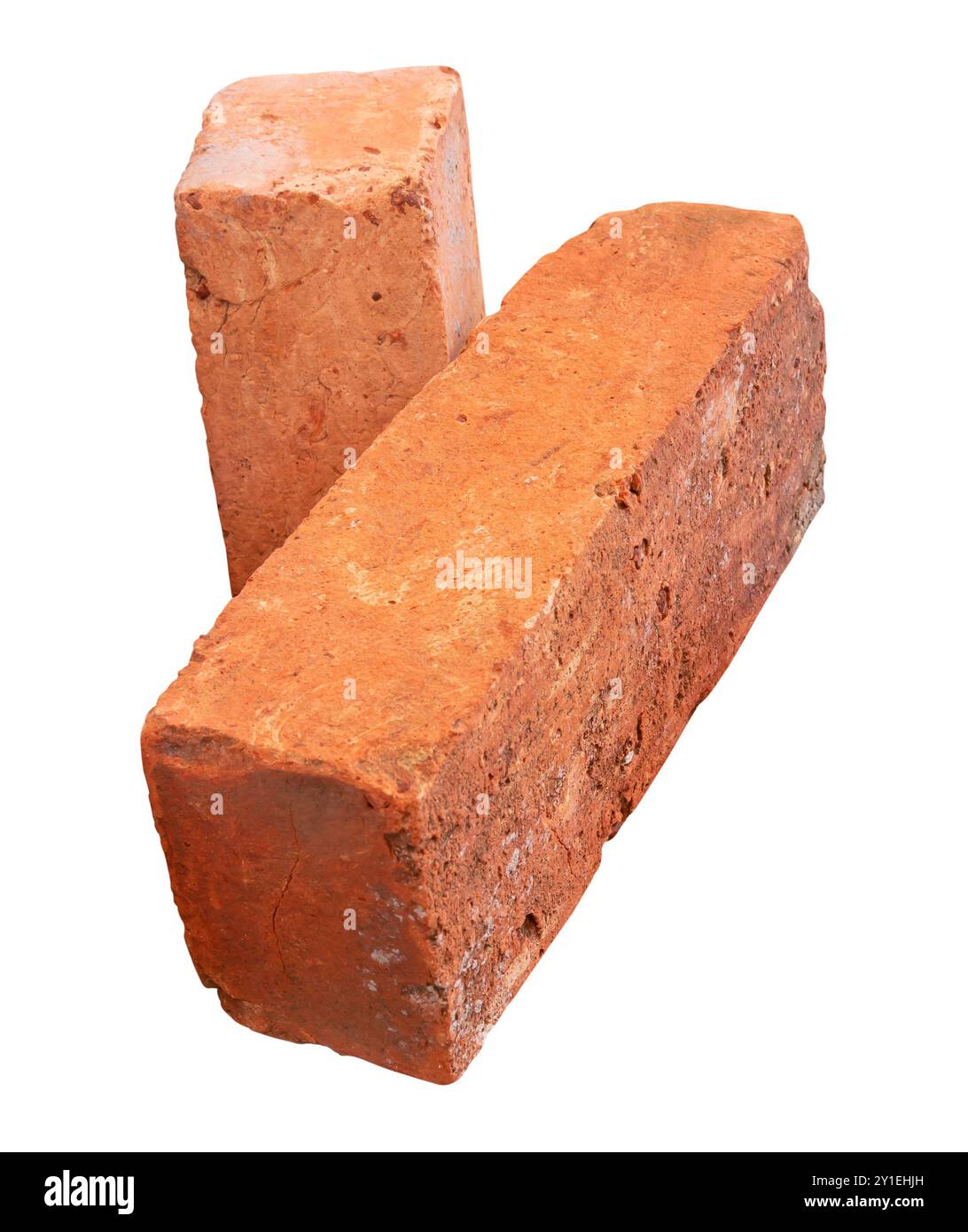 Side view of old red or orange bricks in stack is isolated on white ...