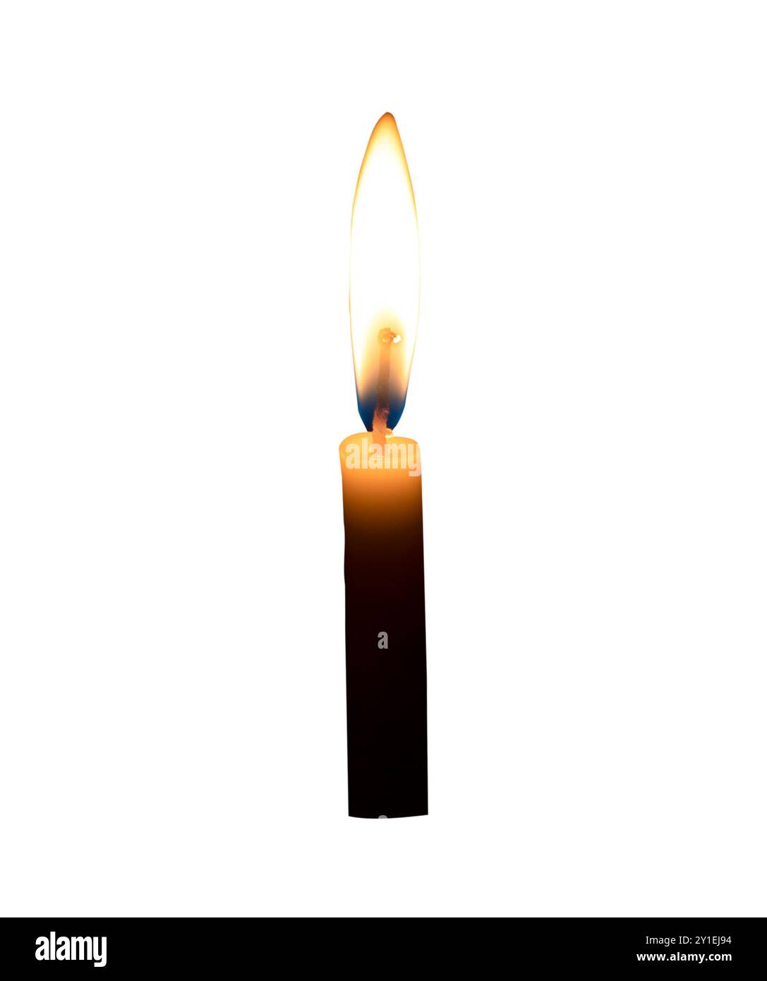 A single burning candle flame or light glowing on a small white candle ...