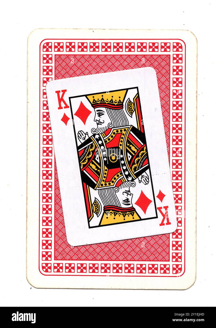 A vintage king of diamonds playing card displayed on the back of ...