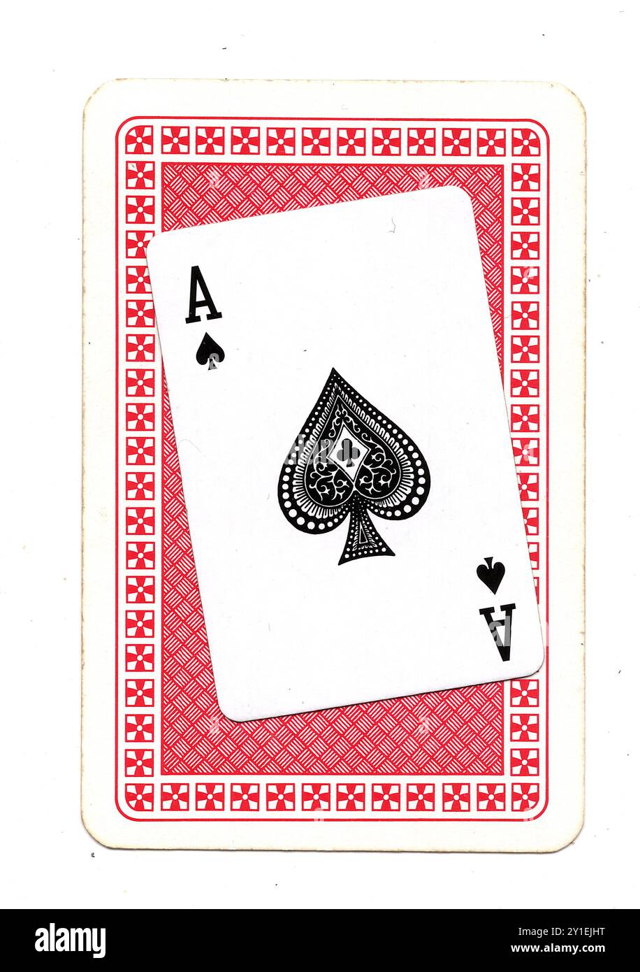 A vintage ace of spades playing card displayed on the back of another ...
