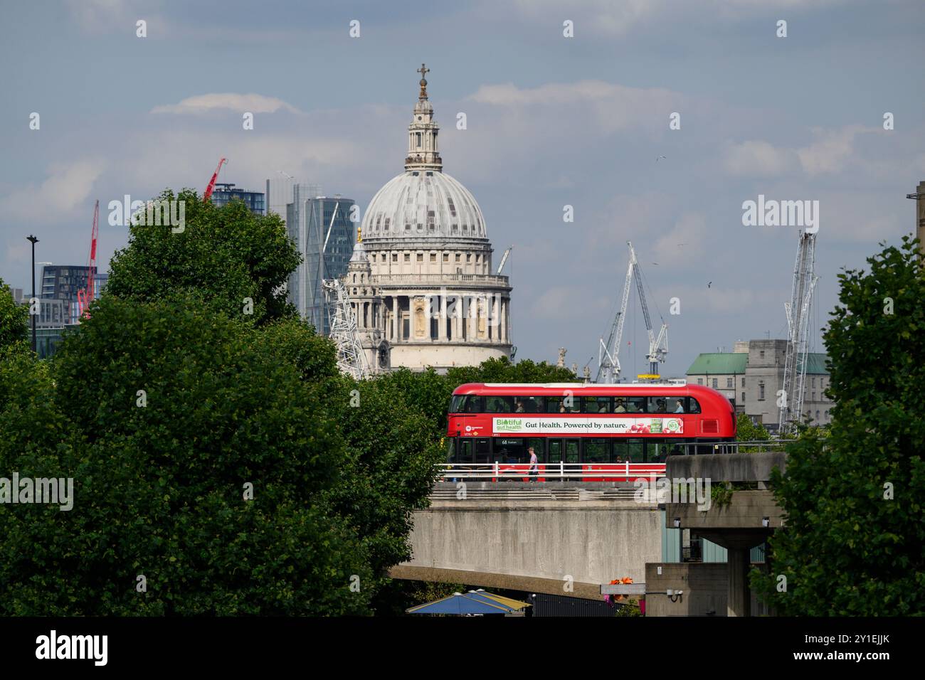 A New Routemaster double-decker bus, also known as a Boris bus crosses ...