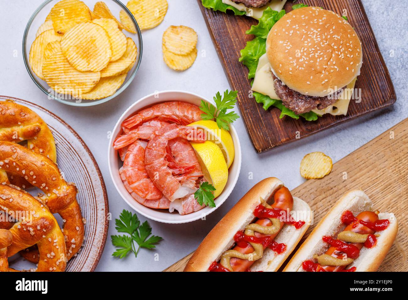 A vibrant photo showcasing various beer snacks and fast food items ...