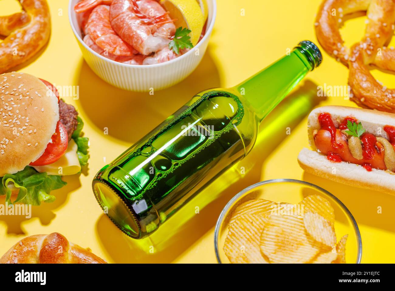 A vibrant photo showcasing a bottle of beer surrounded by various ...