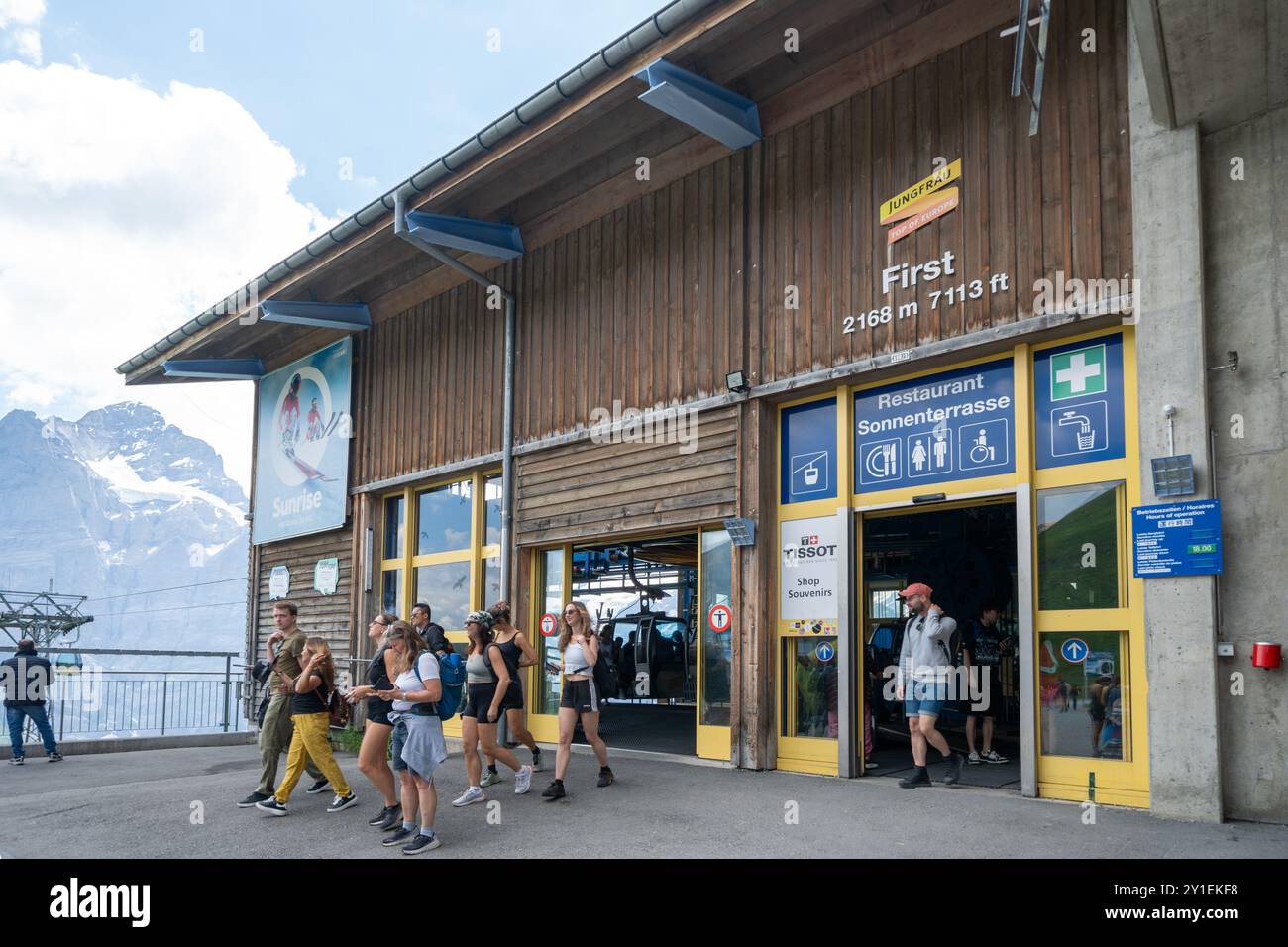 Grindelwald, Switzerland - July 20, 2024: Customers exit the ...