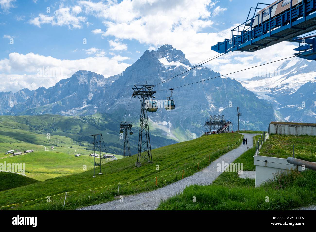 Grindelwald, Switzerland - July 20, 2024: Gondola chair lift cable car ...