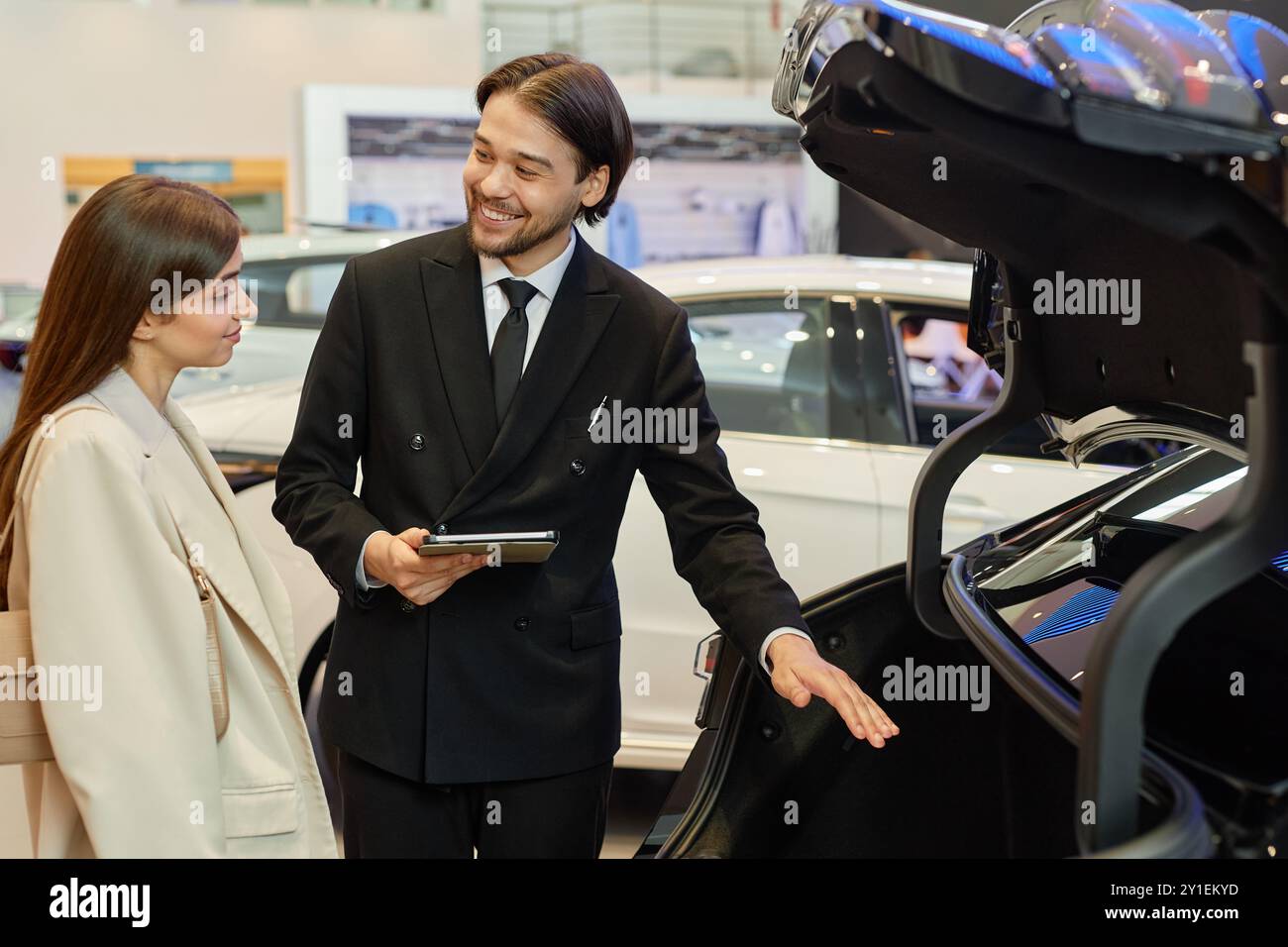 Medium shot asian man demonstrating hi-res stock photography and images ...