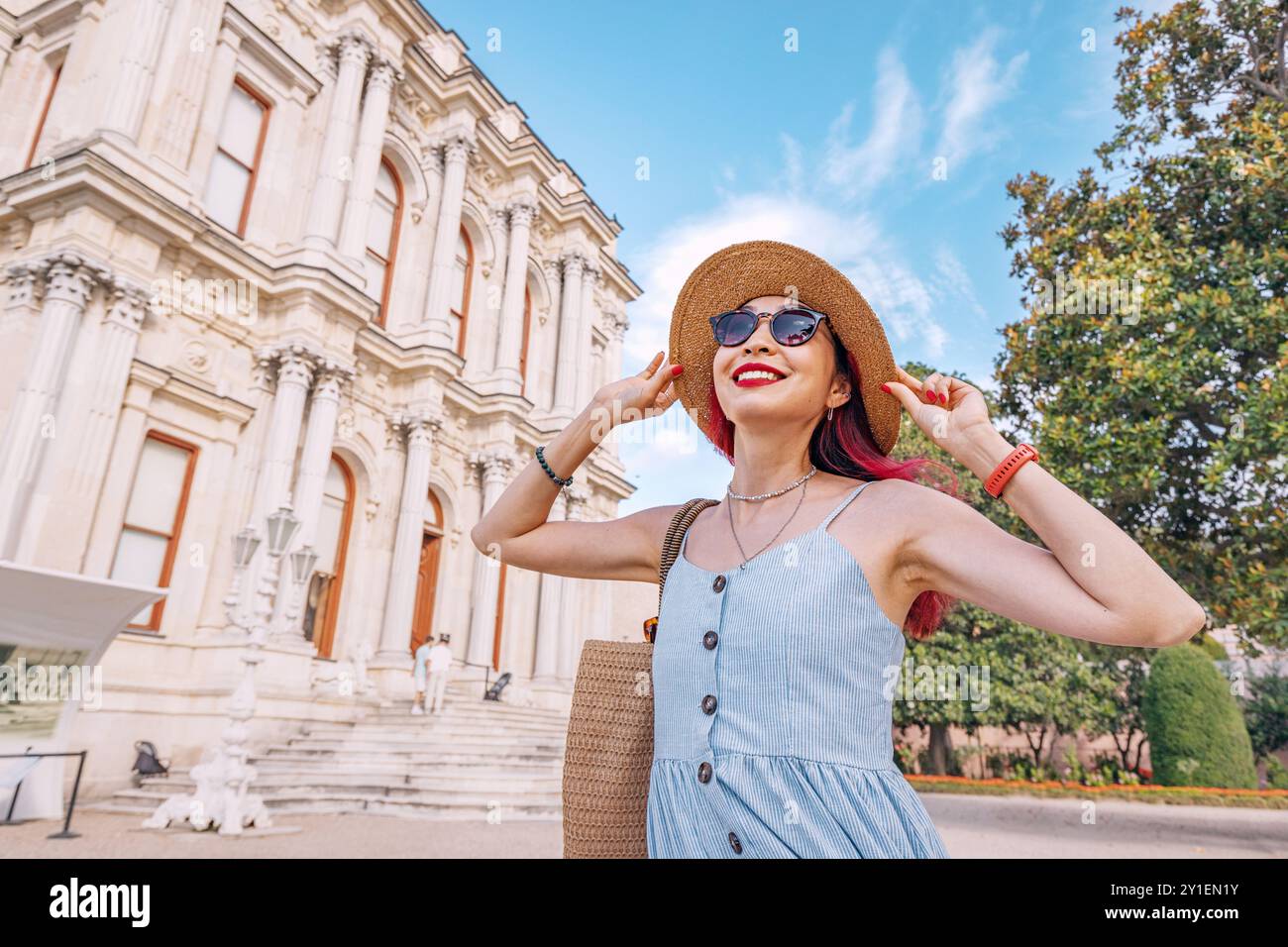 10 July 2024, Istanbul, Turkiye: woman admires the elegant architecture ...