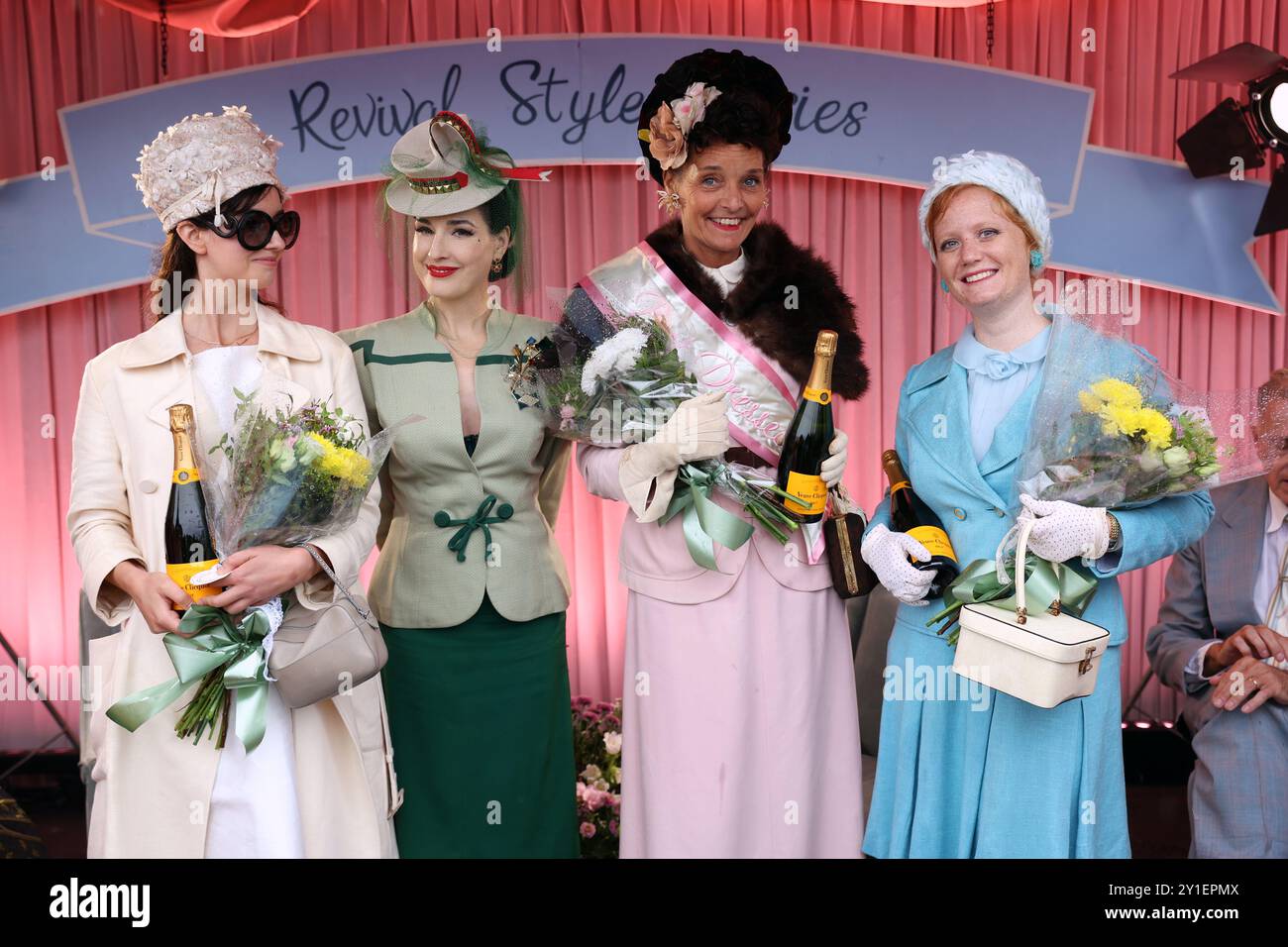Dita Von Teese (second from left) poses with the female winners of the ...