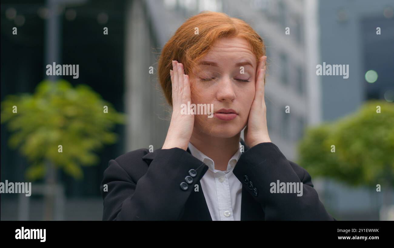 Close up unhappy tired young Caucasian ginger woman gen z businesswoman ...