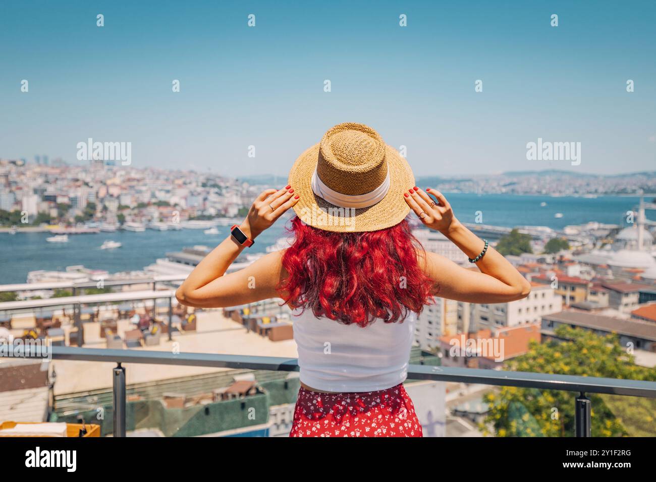 A female traveler, looking relaxed and beautiful, explores the ...