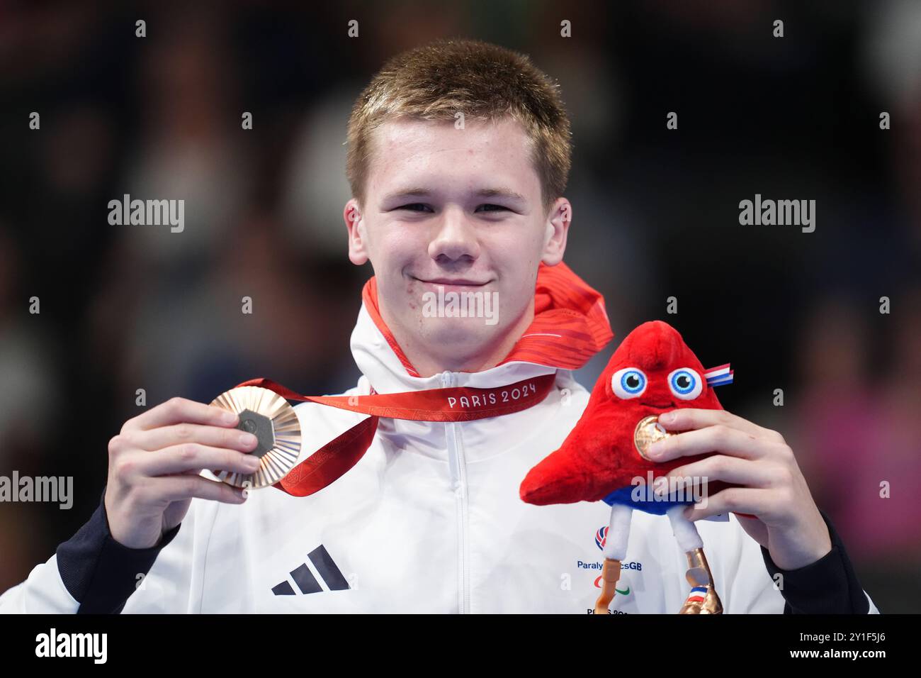 Great Britain's Mark Tompsett with his bronze medal after the Men's ...