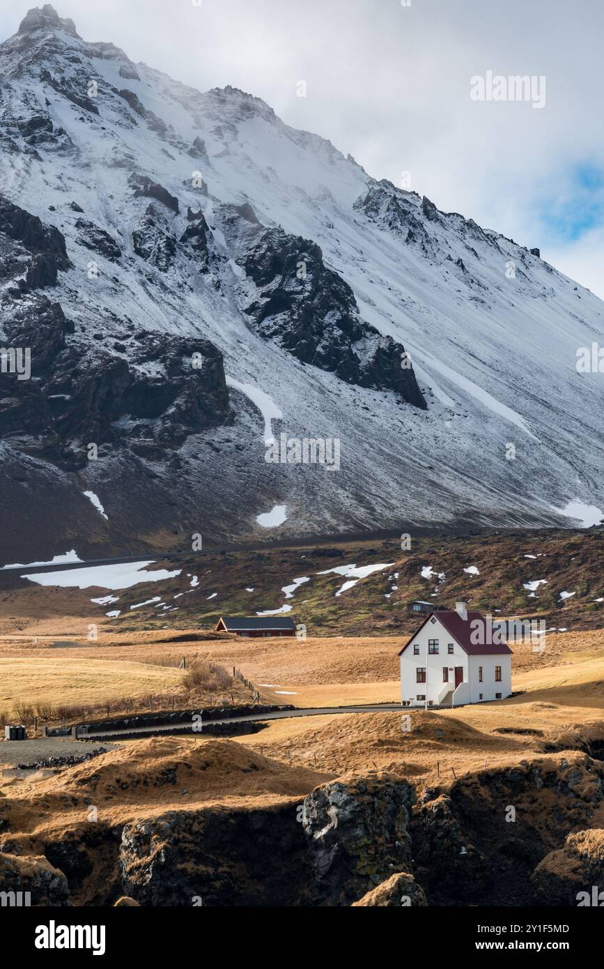 Icelandic landscape with a white small beautiful house under the ...