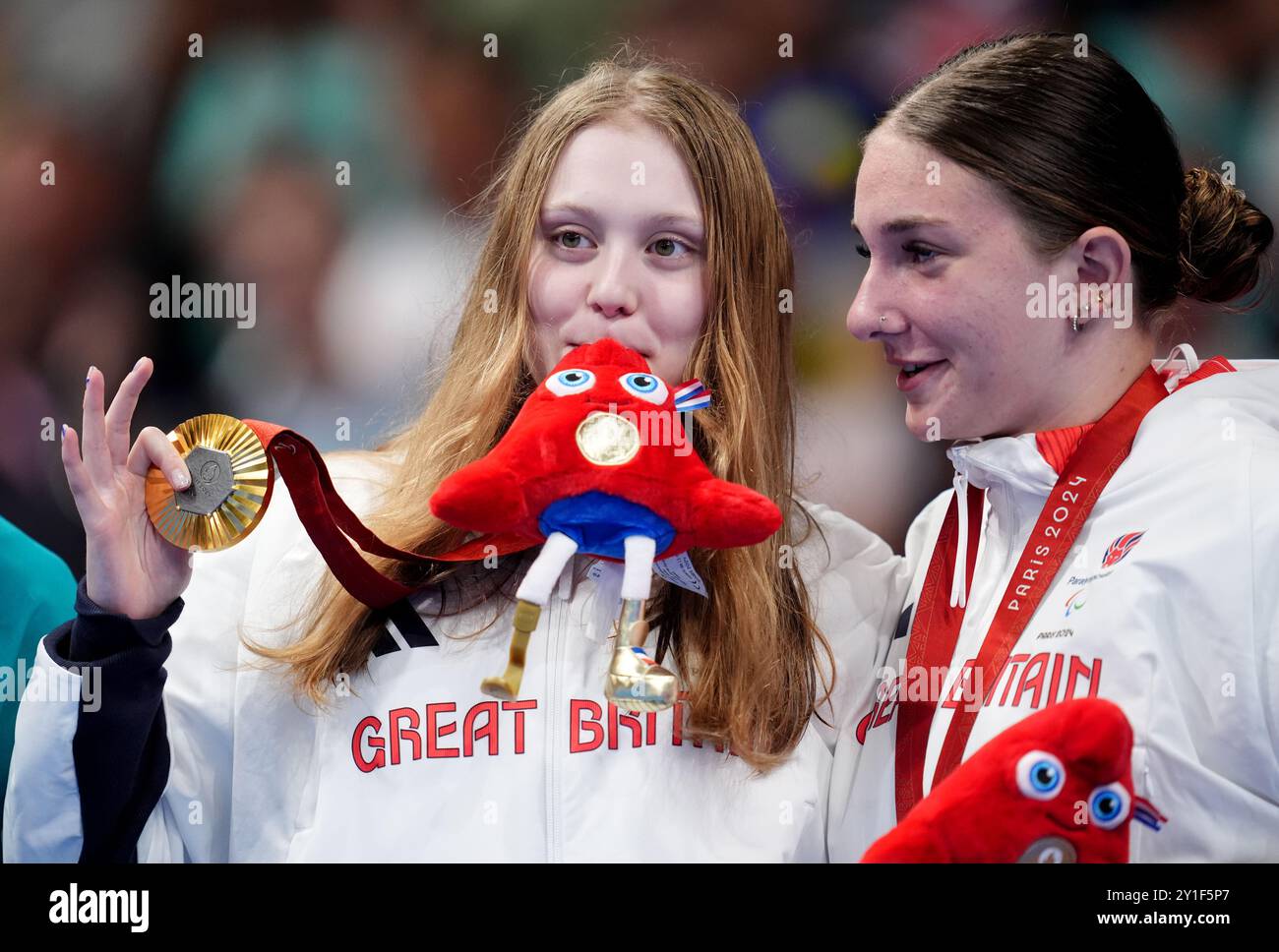 Great Britain's Poppy Maskill (left) with the gold medal and Olivia ...