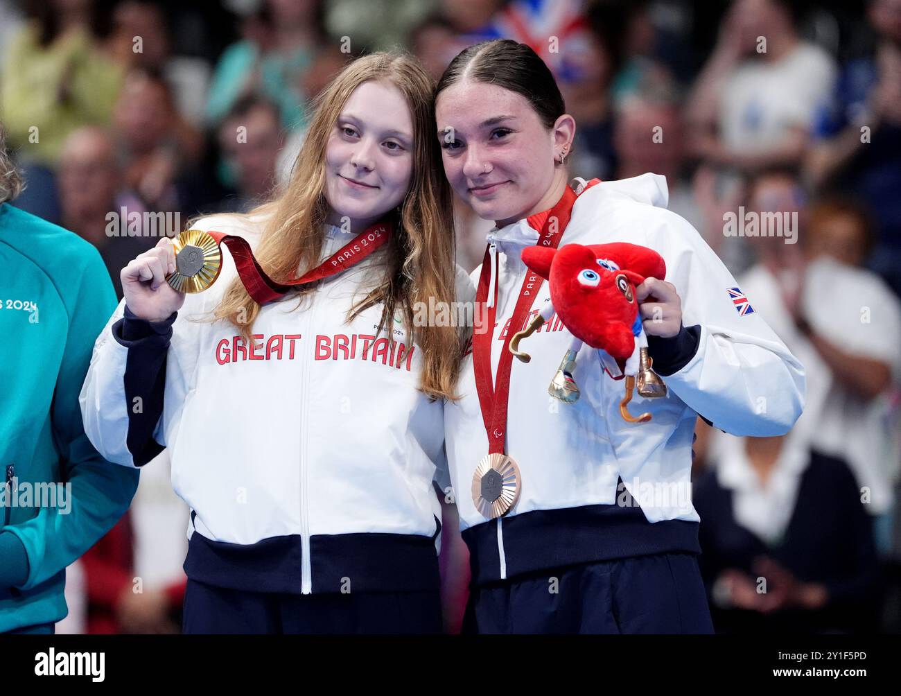 Great Britain's Poppy Maskill (left) with the gold medal and Olivia ...