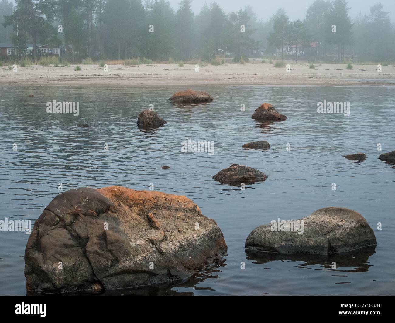 Foggy morning at Bottenviken sea in Norrfjarden, Nordmaling, Sweden ...