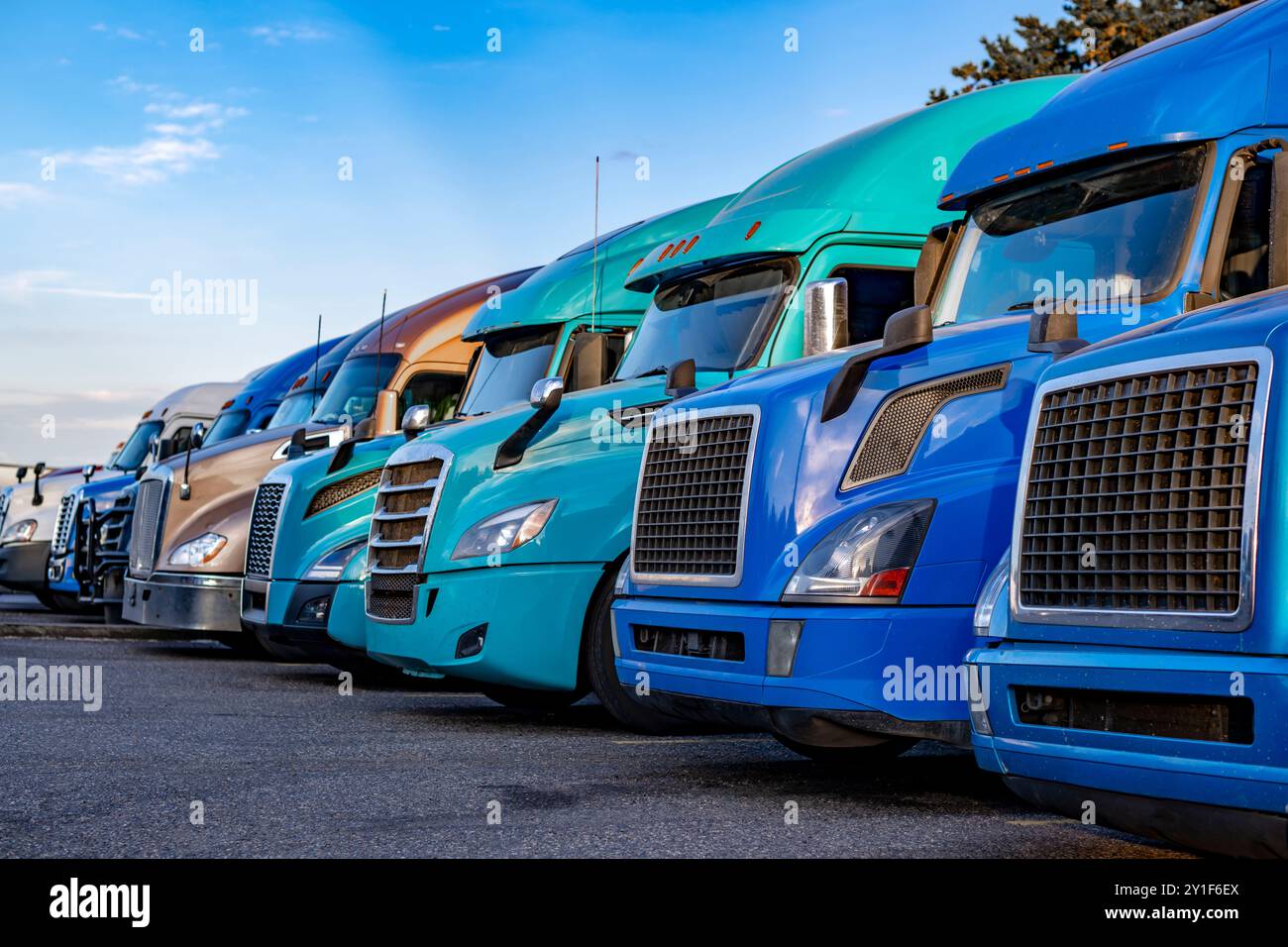 Industrial long hauler carriers big rigs semi trucks with loaded semi ...