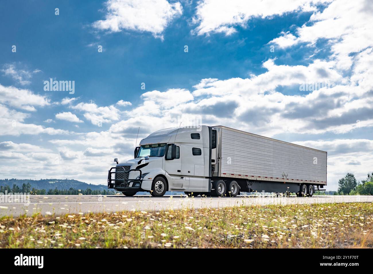 Classic white long haul big rig semi truck tractor with extended cab ...
